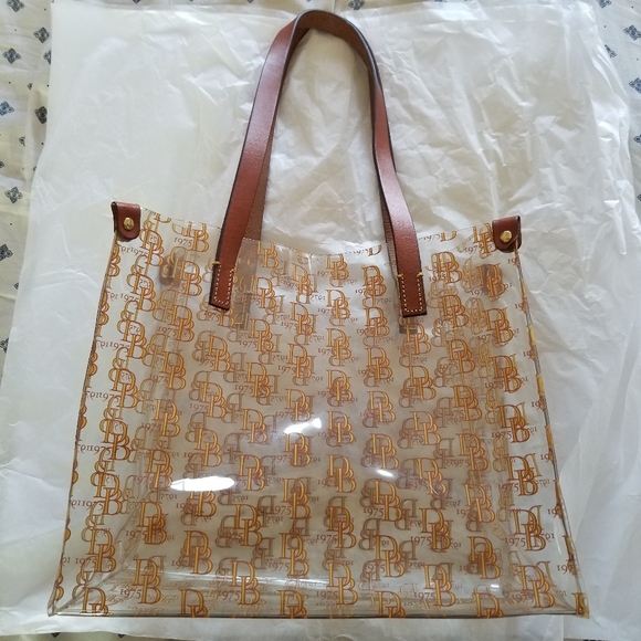 Dooney & Bourke | Bags | Dooney Bourke Clear Logo Tote | Poshmark